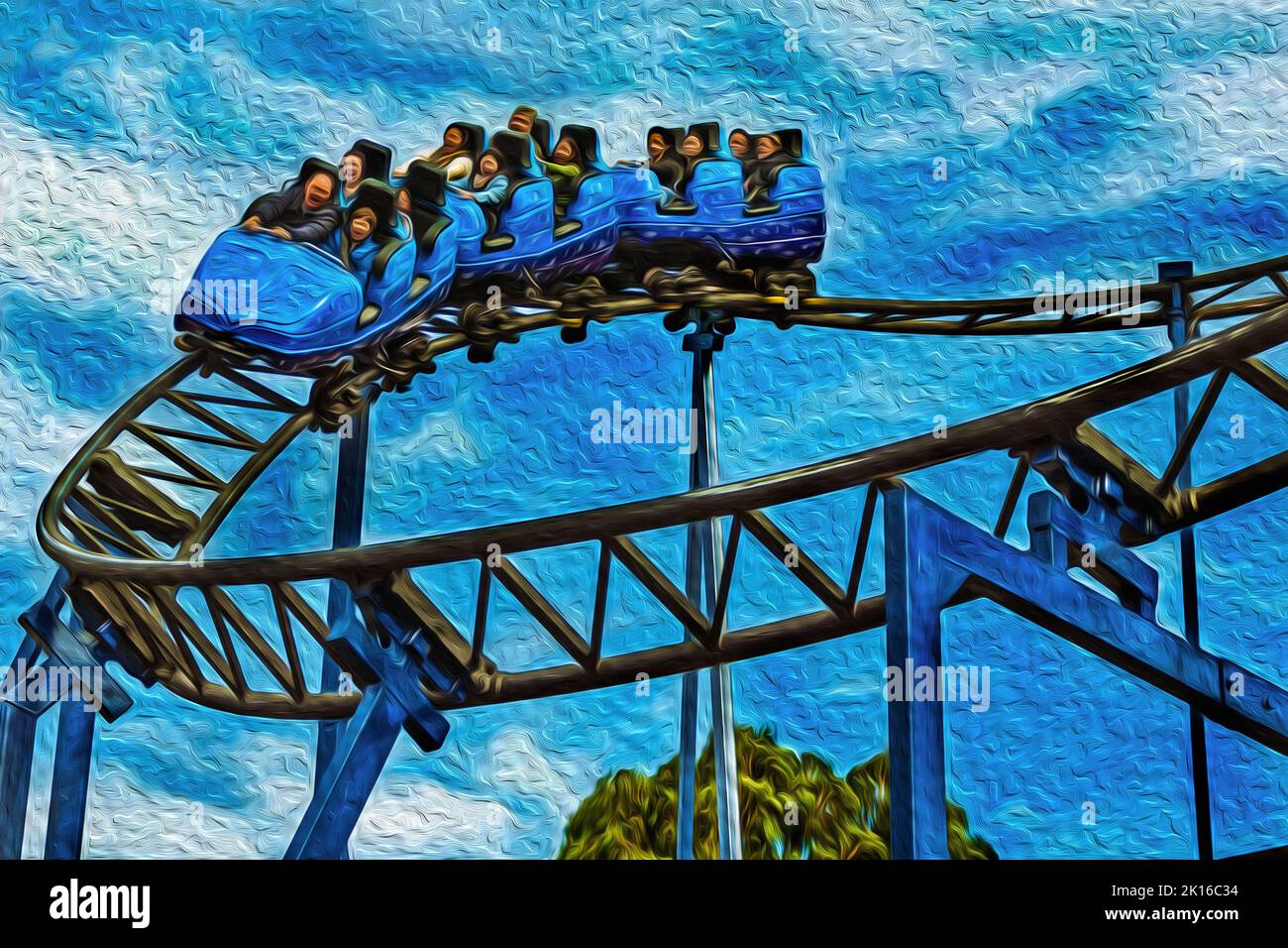 People on a blue cart having fun on roller coaster in an amusement park ...