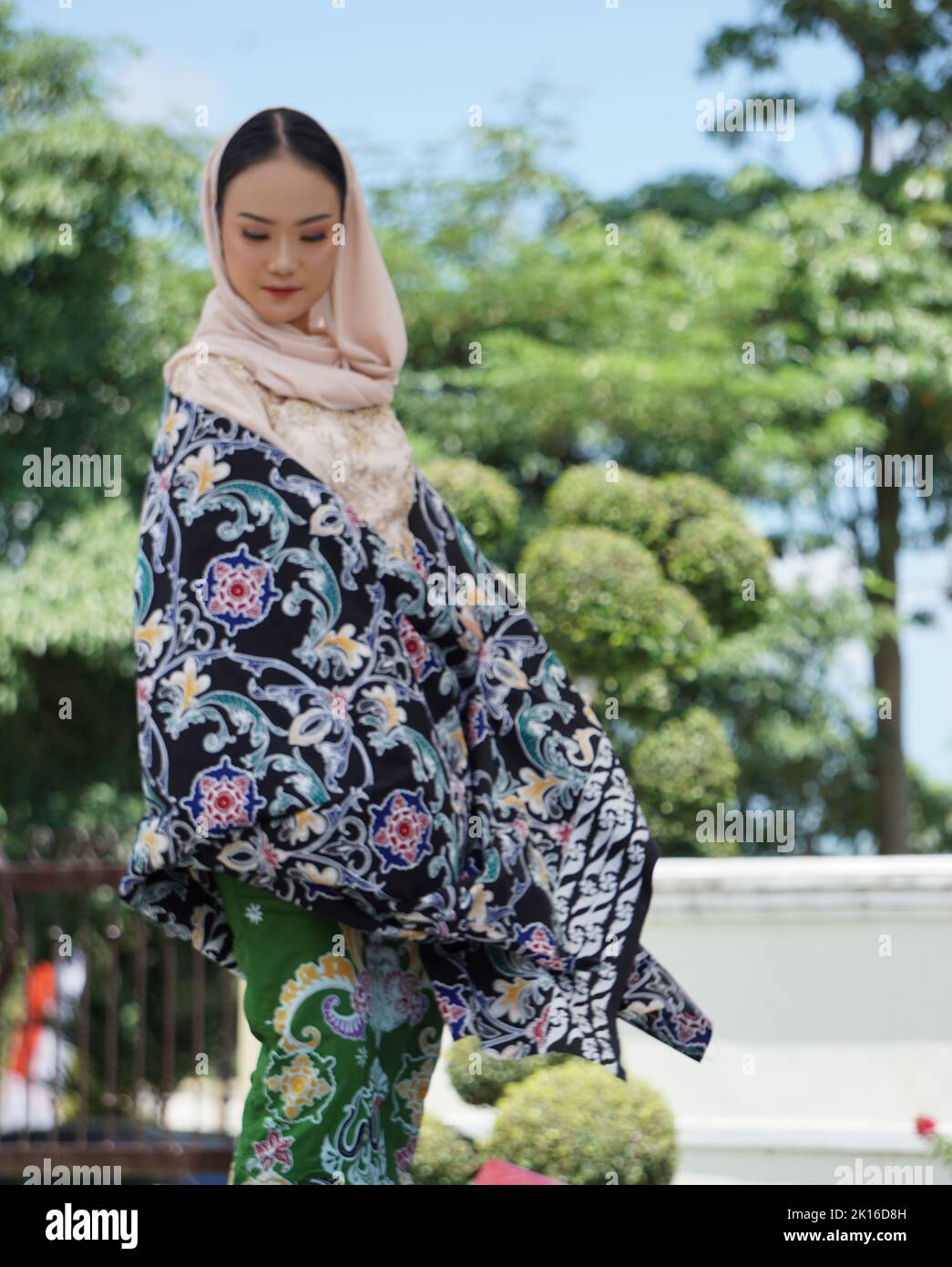 The beautiful Indonesian woman with traditional cloth which is called ...