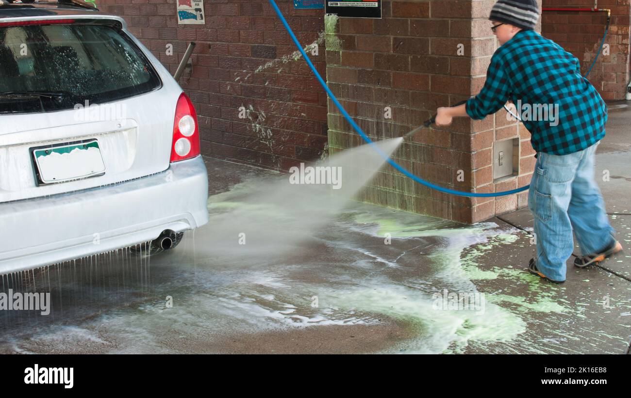 Boy child cleaning window hi-res stock photography and images - Alamy