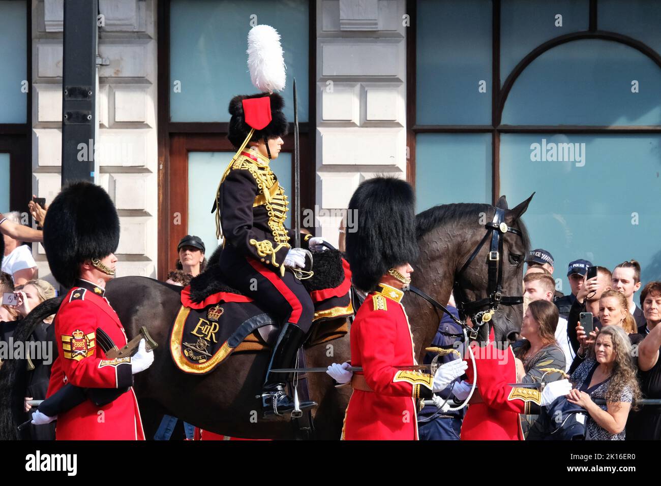 London, UK. The Queen's coffin procession reaches Whitehall led by a ...