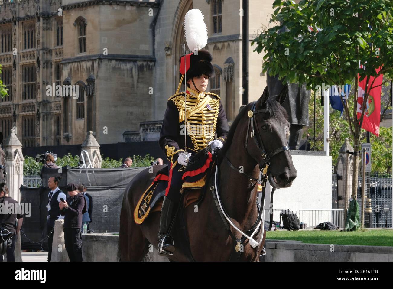 A mounted guard rides along Parliament Square after performing in the ...