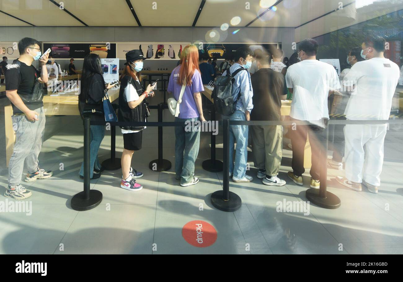 HANGZHOU, CHINA - SEPTEMBER 16, 2022 - Customers wait in line to buy ...