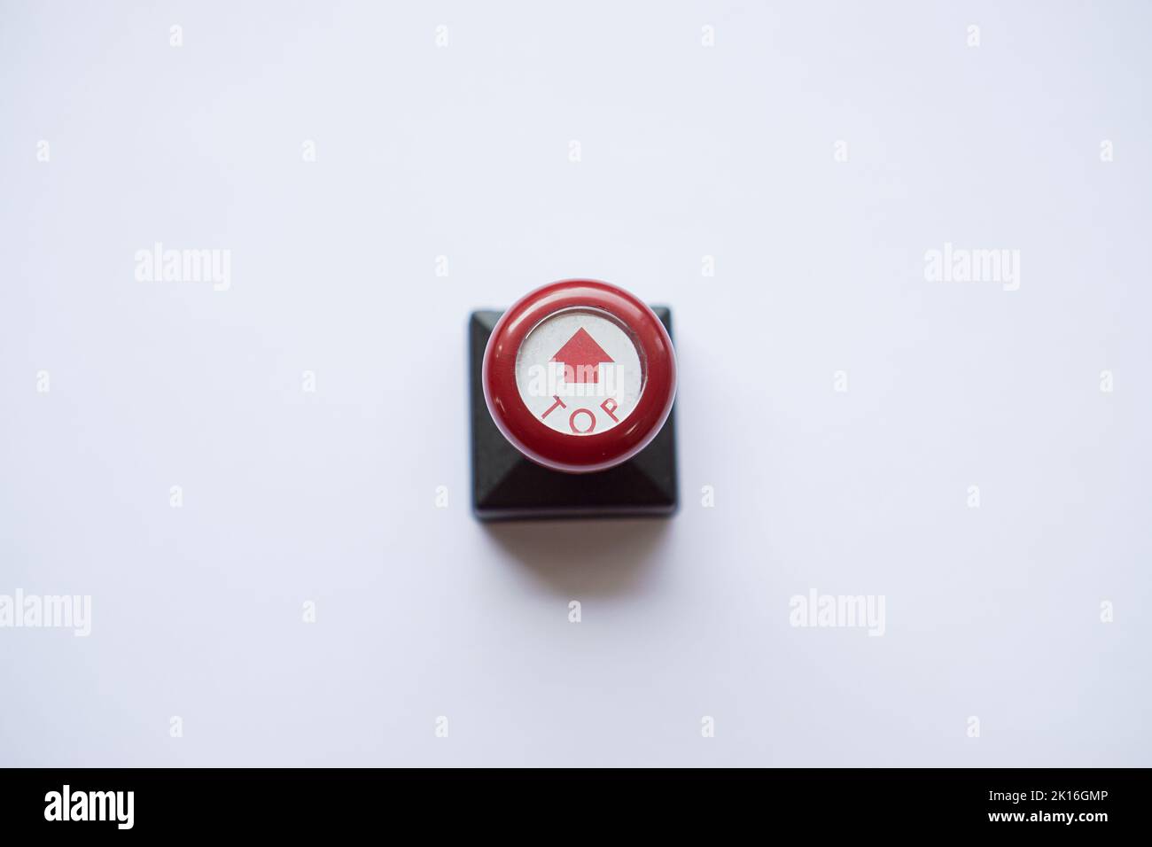 stamp with red handle, arrow and top words isolated on white Stock ...