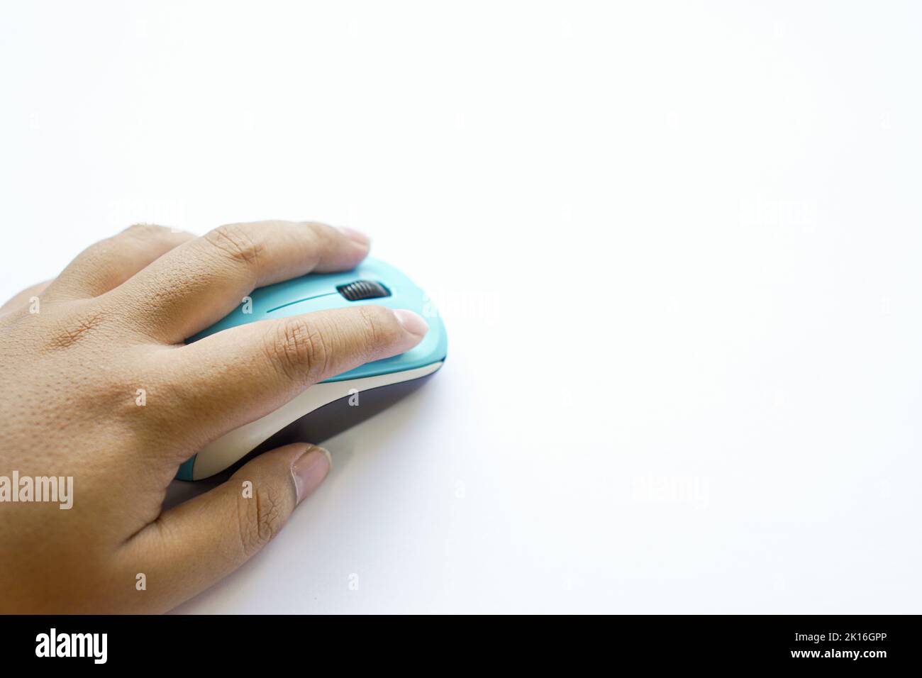 human hand on a light blue wireless mouse isolated on white Stock Photo ...