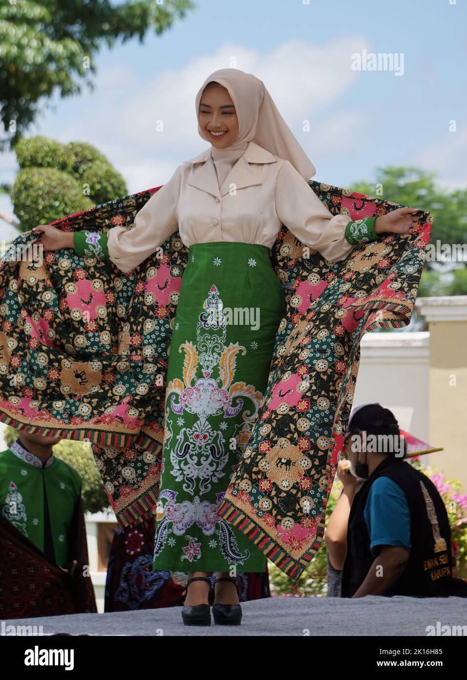 The beautiful Indonesian woman with traditional cloth which is called ...