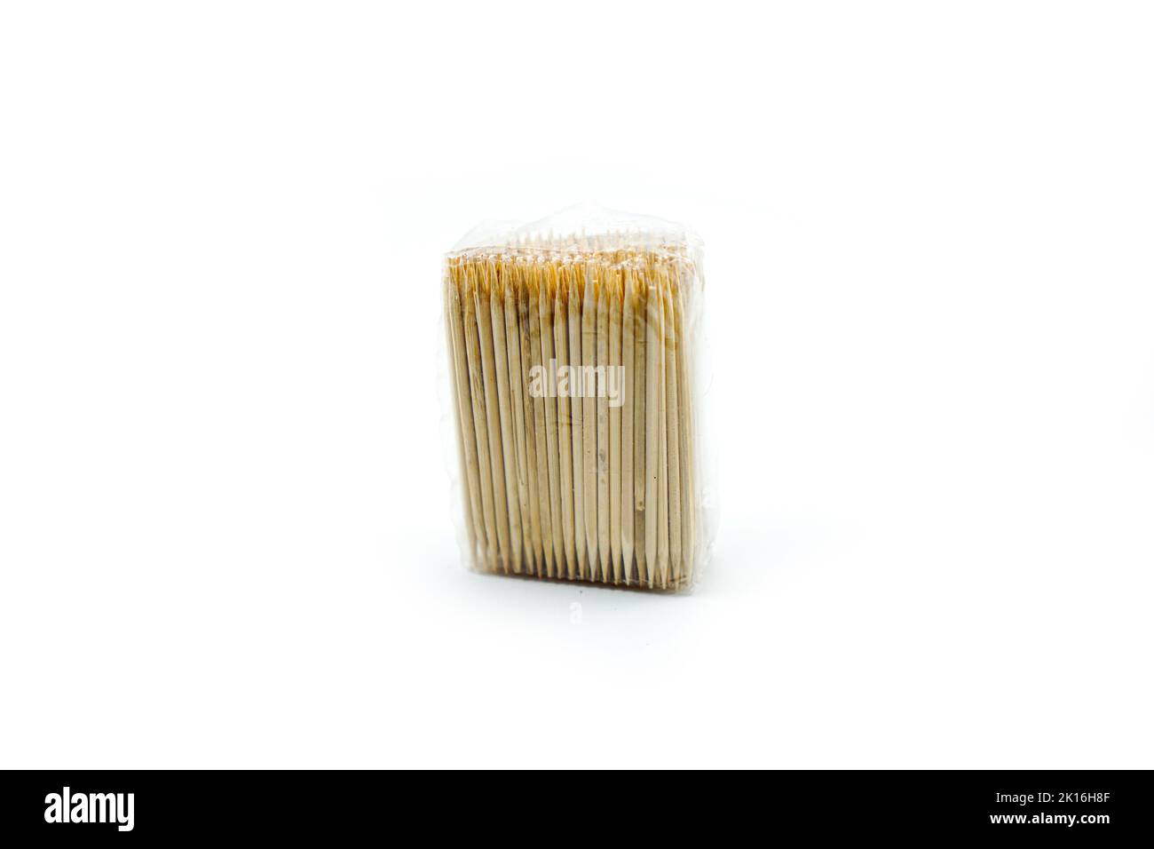 toothpick made of wood wrapped in plastic isolated on a white ...