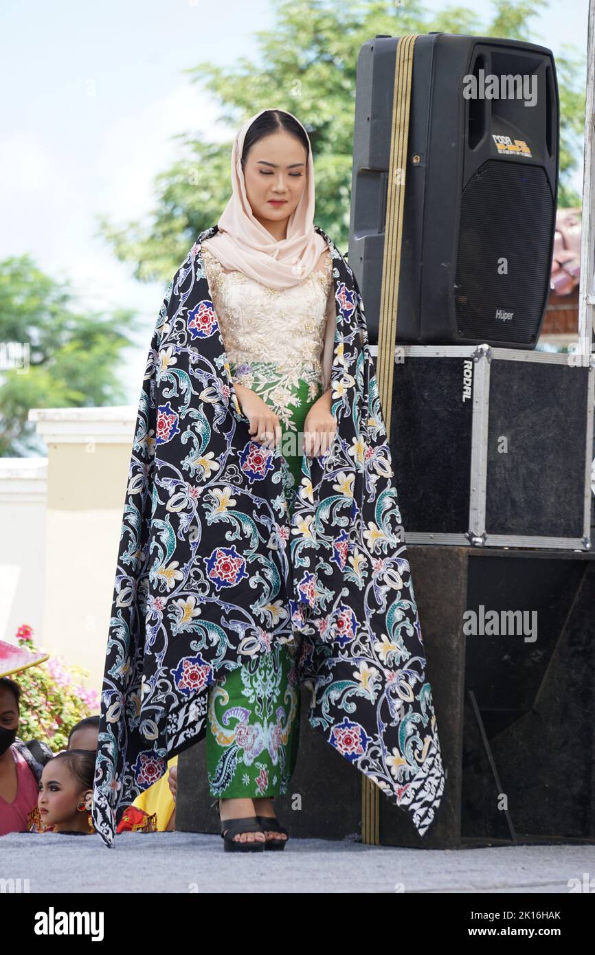 The beautiful Indonesian woman with traditional cloth which is called ...