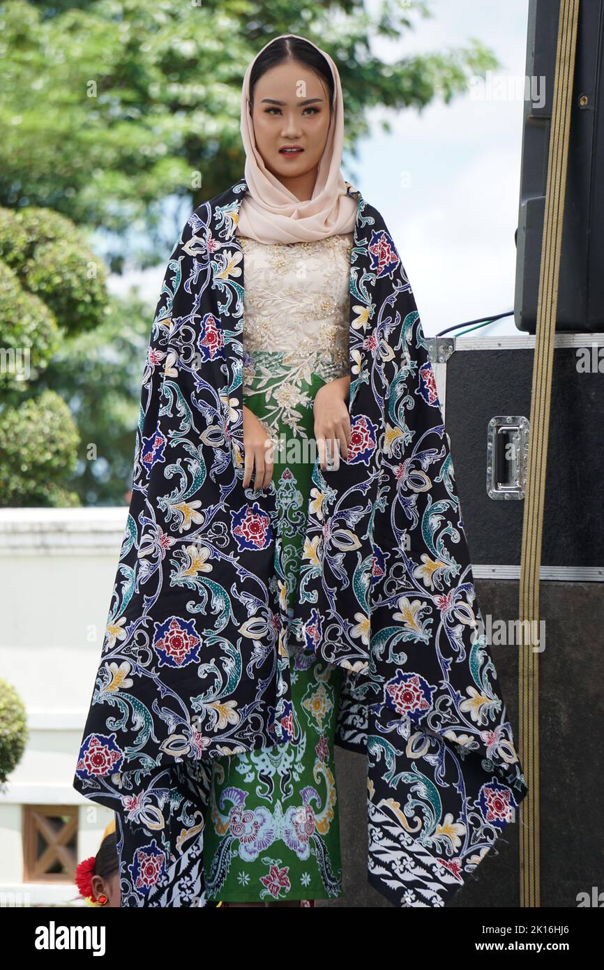 The beautiful Indonesian woman with traditional cloth which is called ...