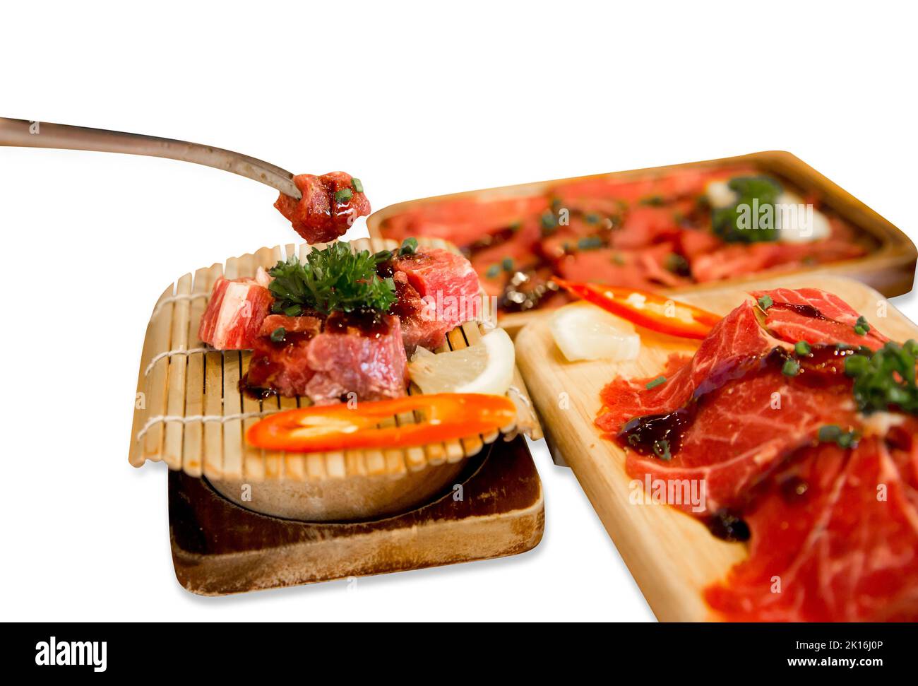 Dice beef and Striped calf beef put and serve on the wooden on white ...
