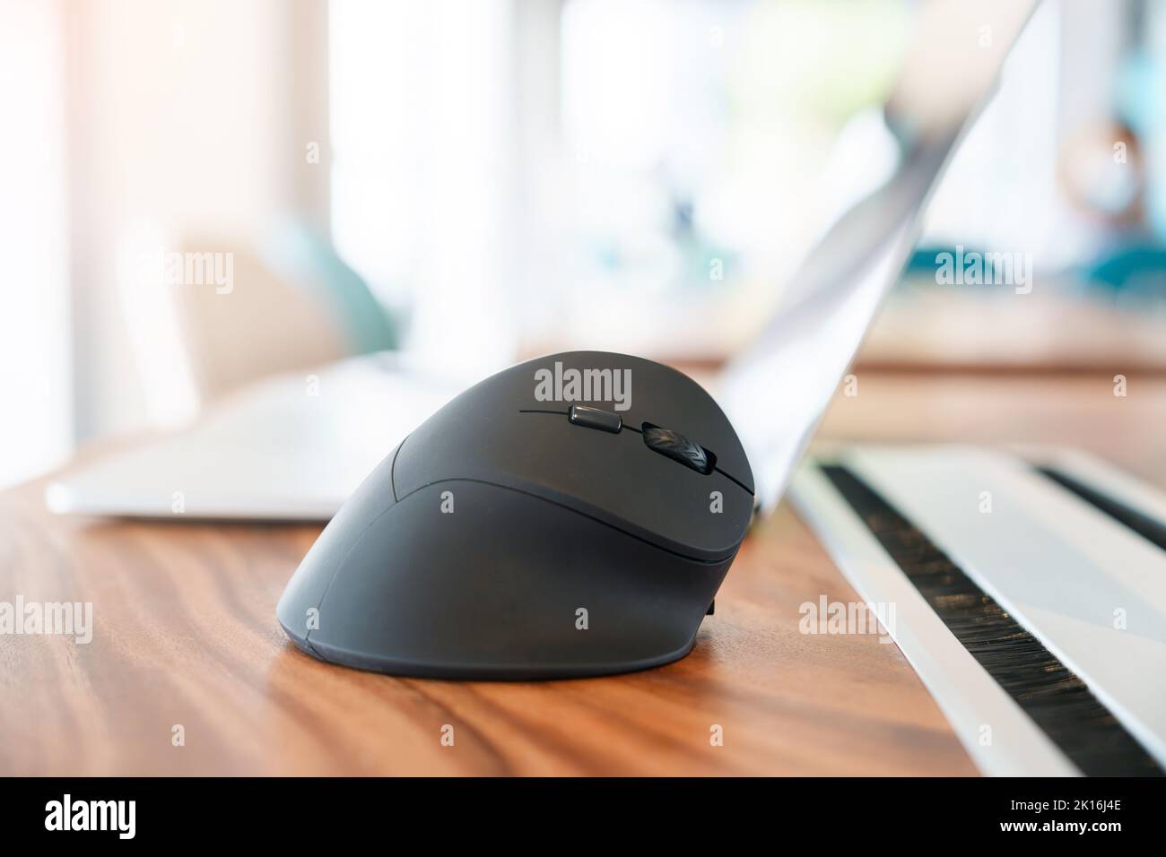 ergonomic mouse on desk at workplace, prevention wrist pain because ...