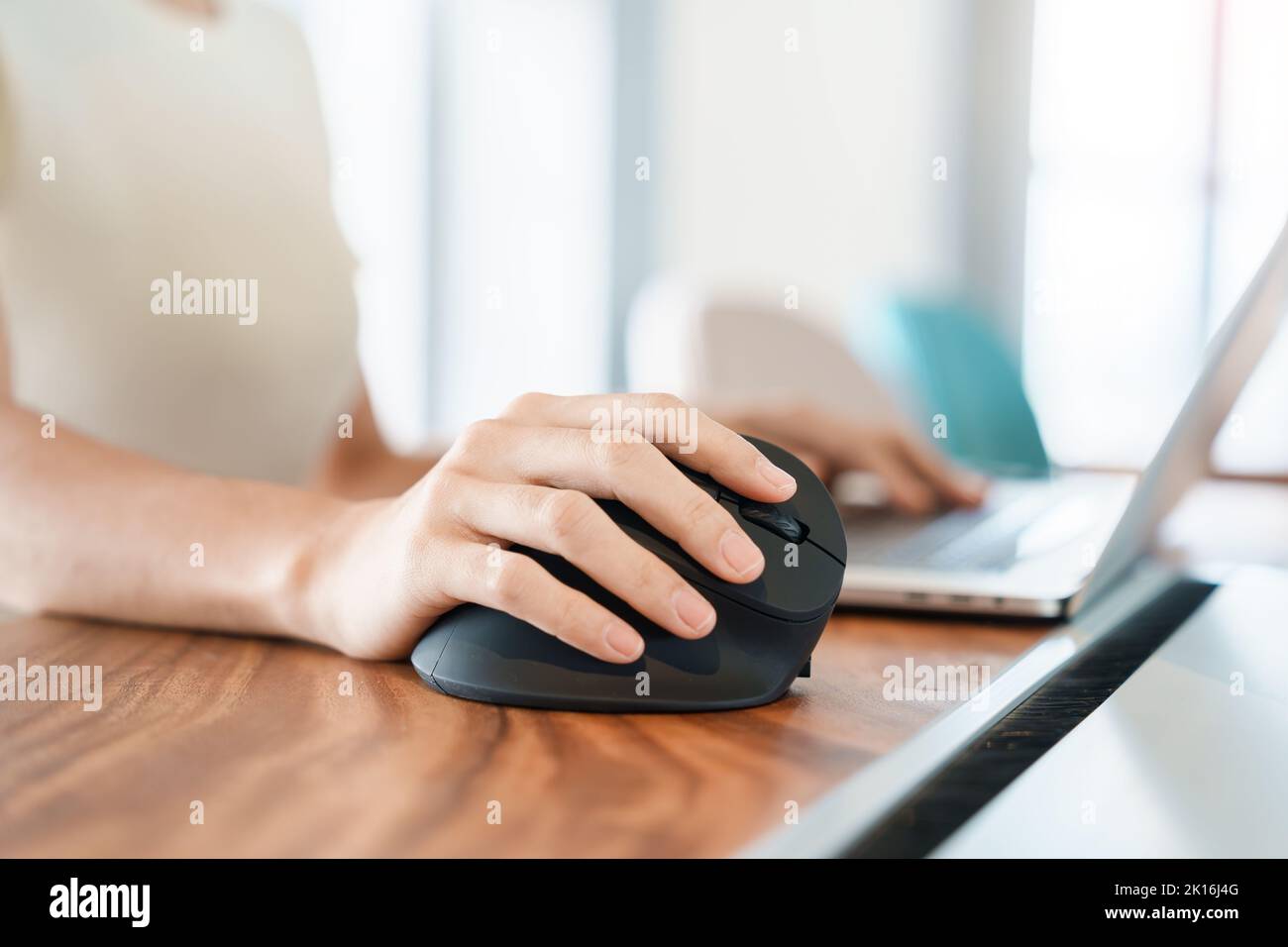 woman hand using computer ergonomic mouse, prevention wrist pain ...