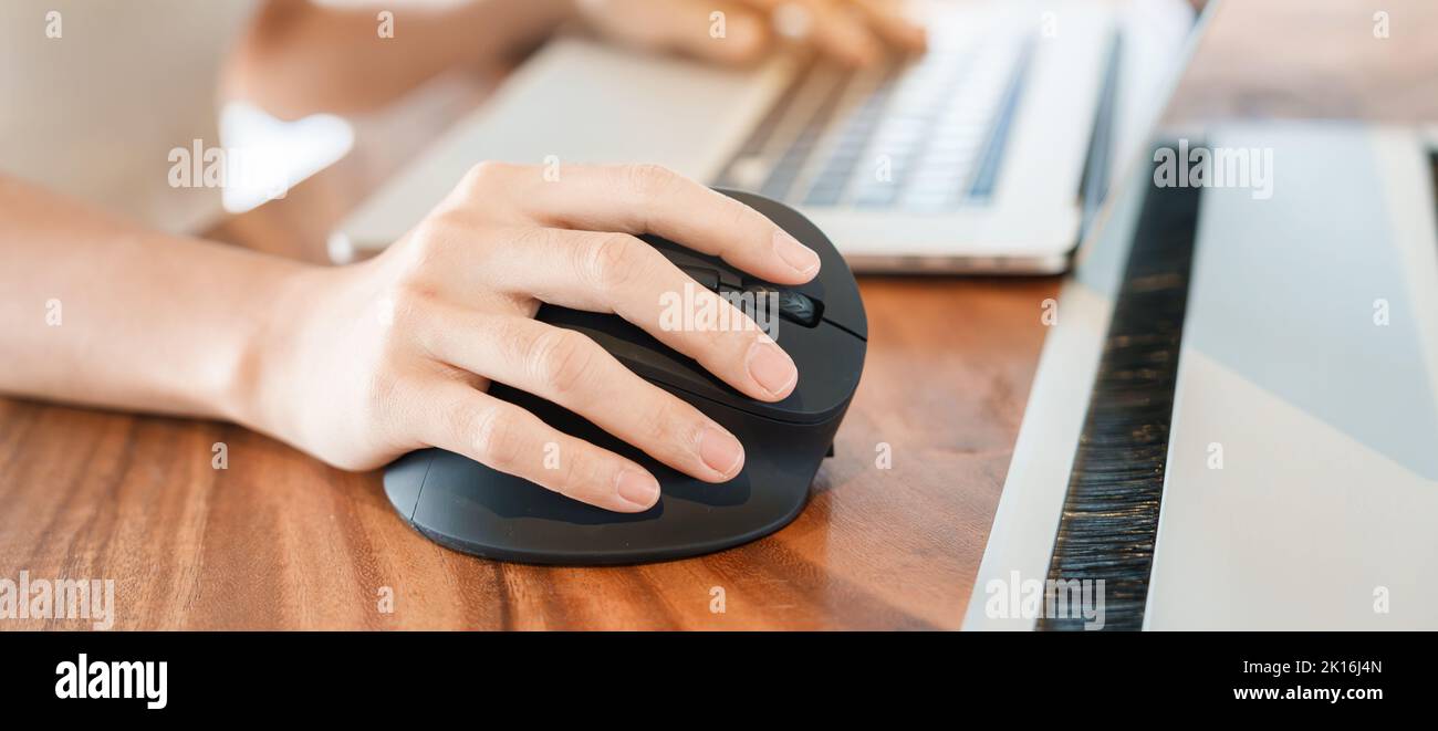 woman hand using computer ergonomic mouse, prevention wrist pain ...