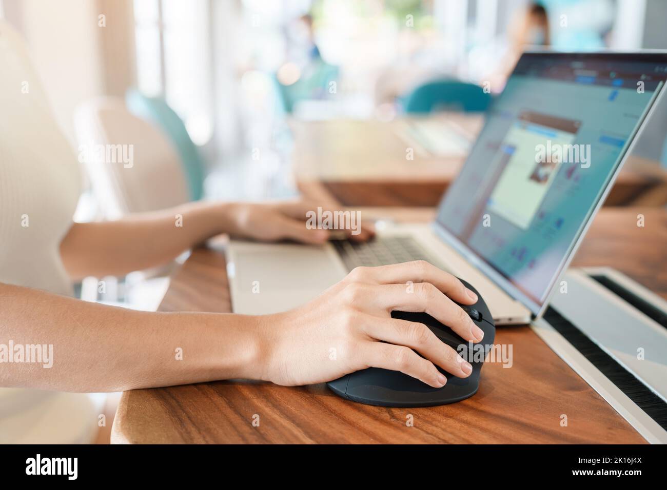 woman hand using computer ergonomic mouse, prevention wrist pain ...