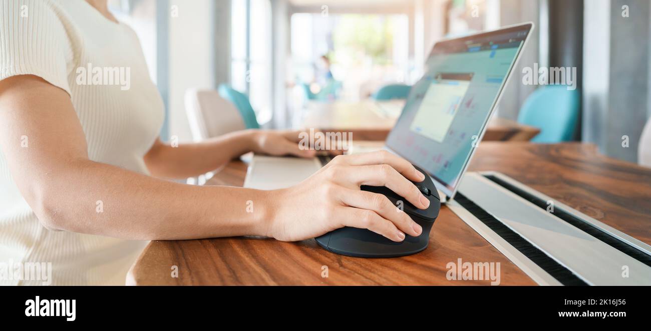 woman hand using computer ergonomic mouse, prevention wrist pain ...
