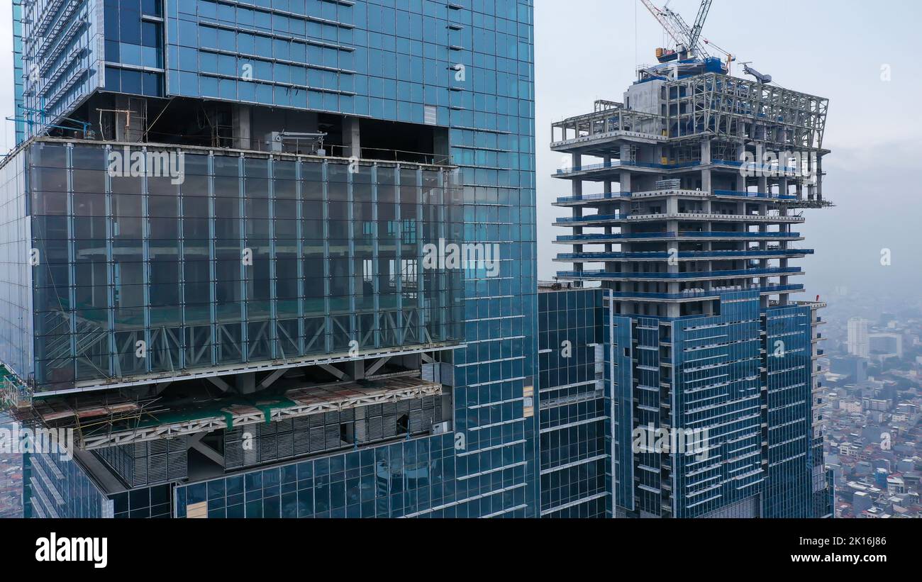 Two skyscrapers during construction. Skyscrapers under construction ...