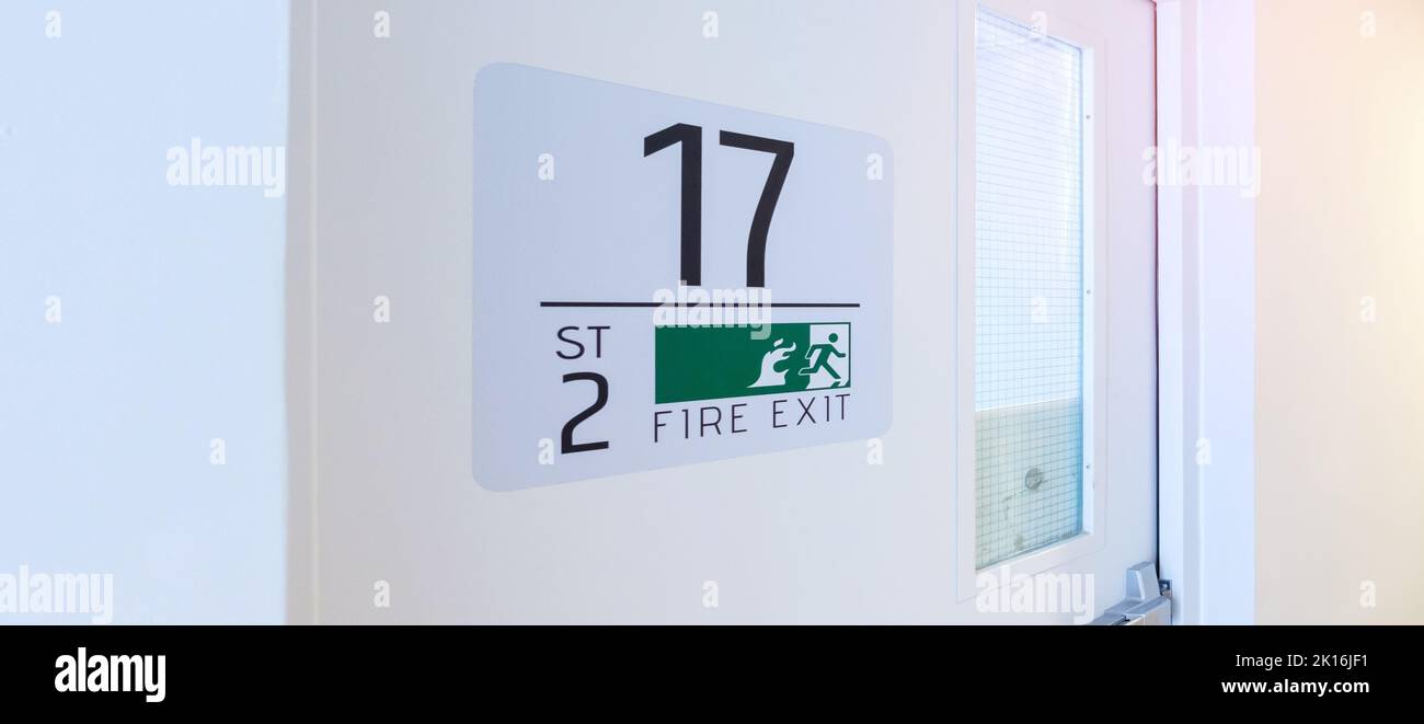Fire Exit door sign for emergency. Stairwell fire for escape in ...