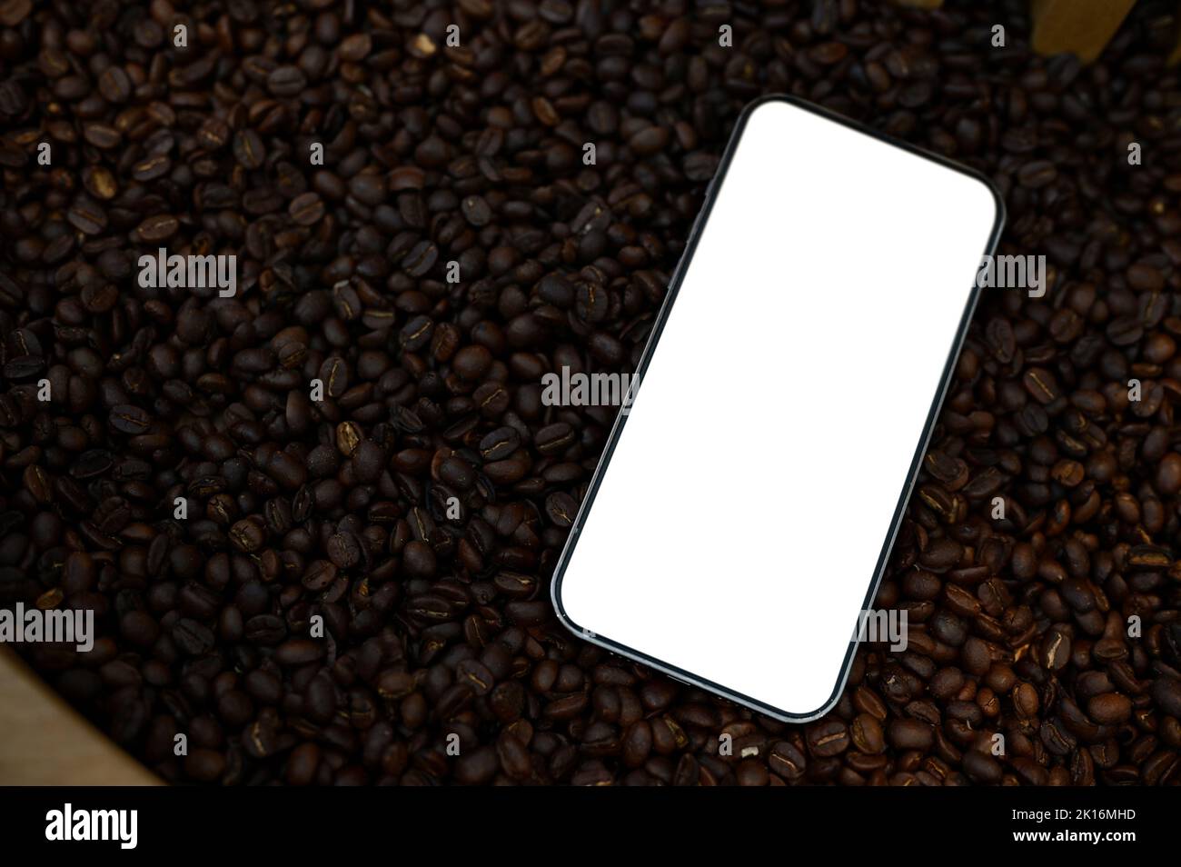 Top view, A smartphone white screen mockup for display your graphic is ...