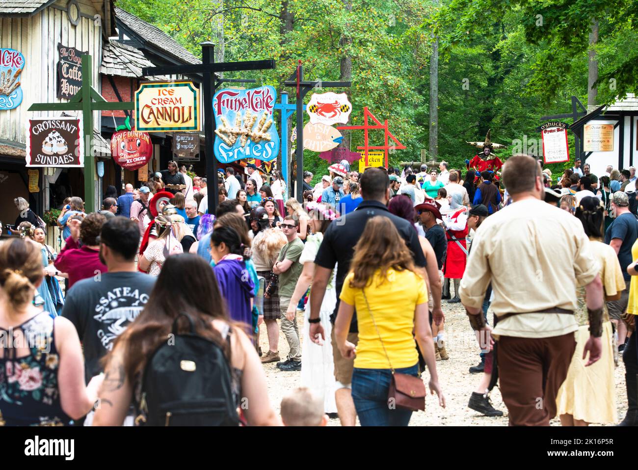 Large crowds at the 2022 Maryland Renaissance Festival, walking past ...
