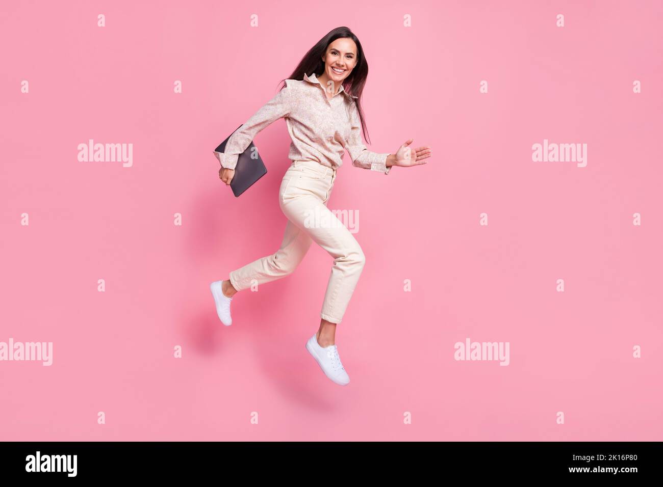 Full length photo of marketer lady jump hurry for digital web discounts ...