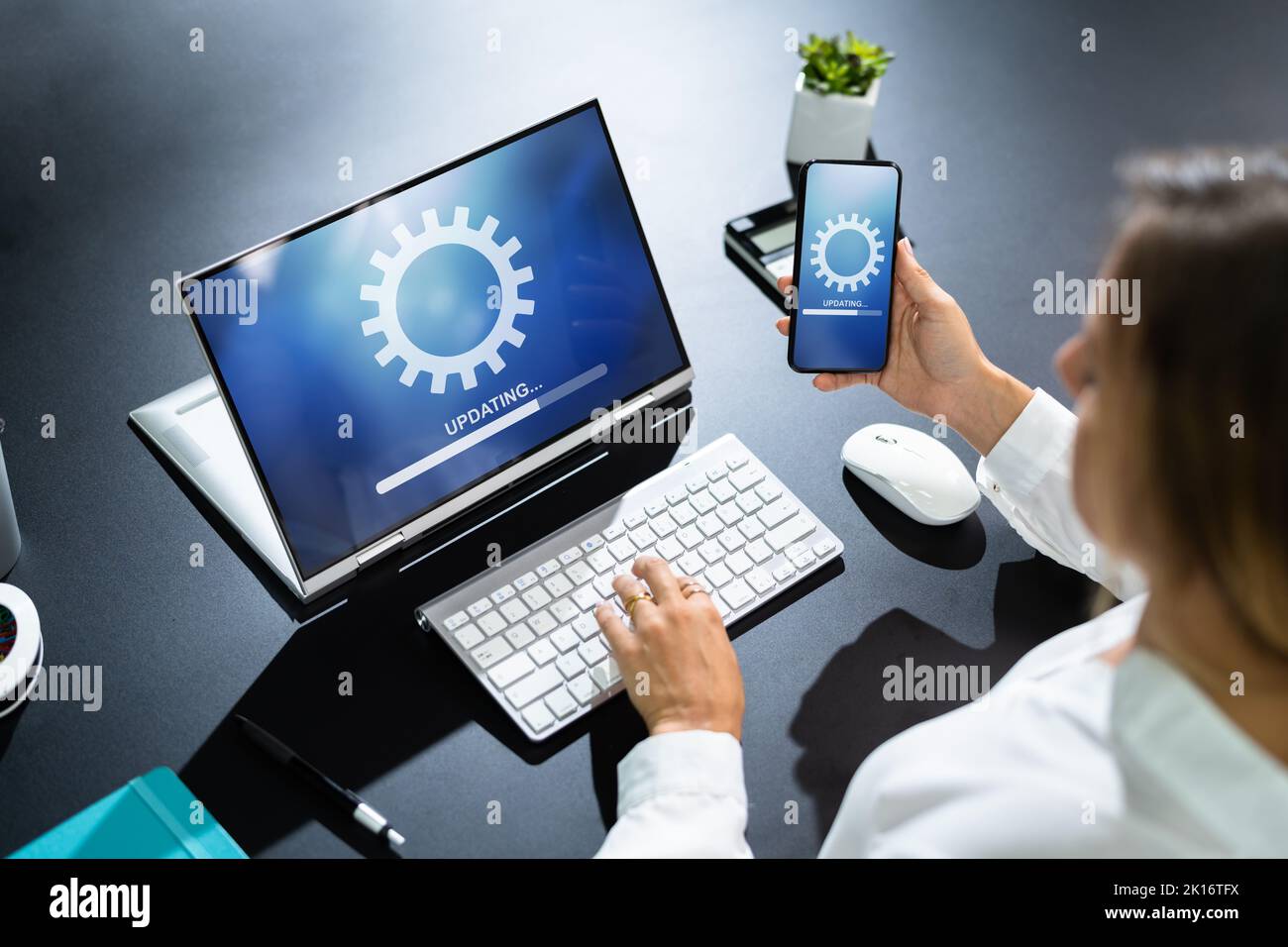Laptop update hi-res stock photography and images - Alamy