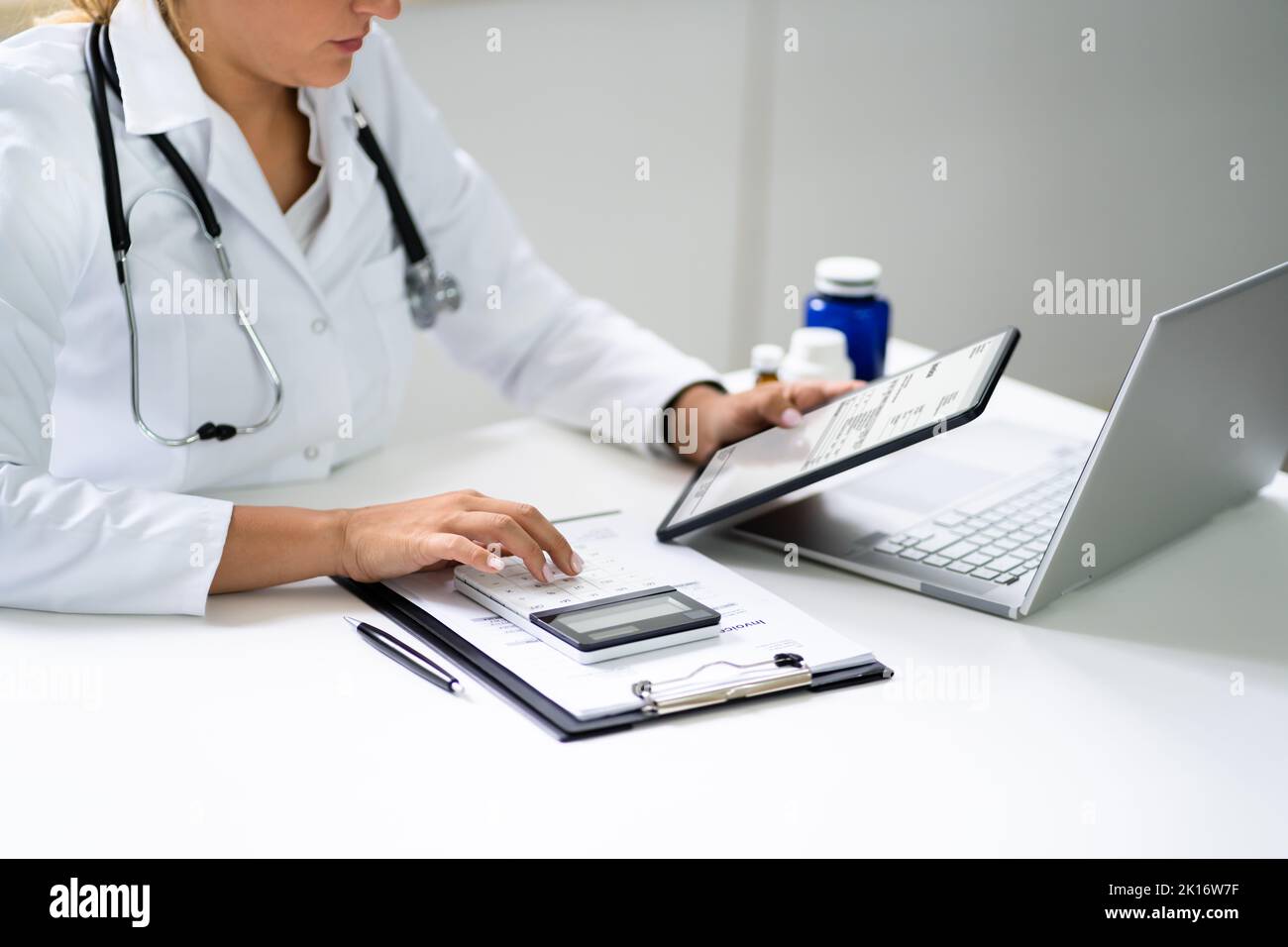 Medical Hospital Bill And Expenses Calculator. Health Money Stock Photo ...