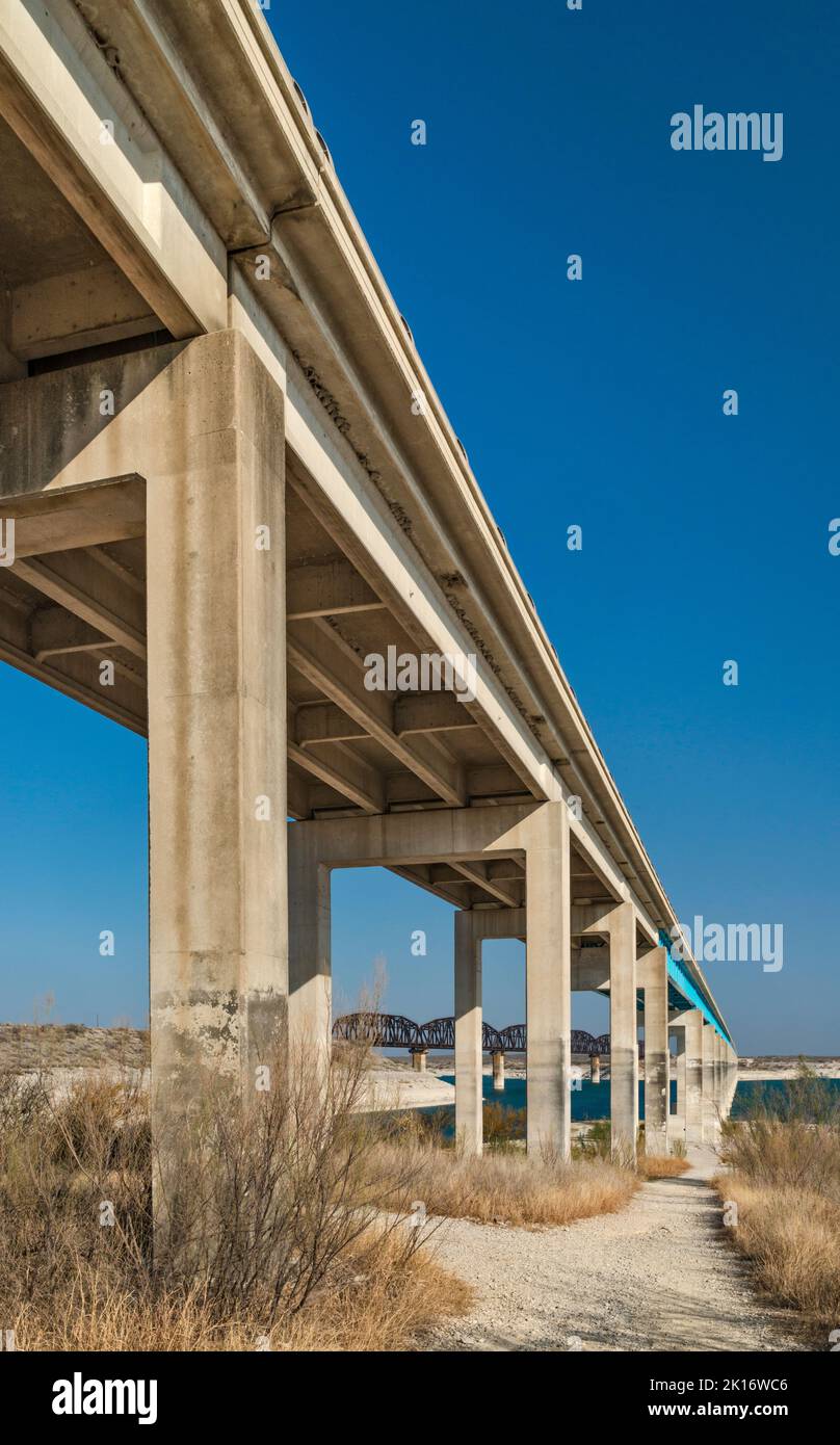 US-90 highway and railway bridges across Amistad Reservoir, very low ...