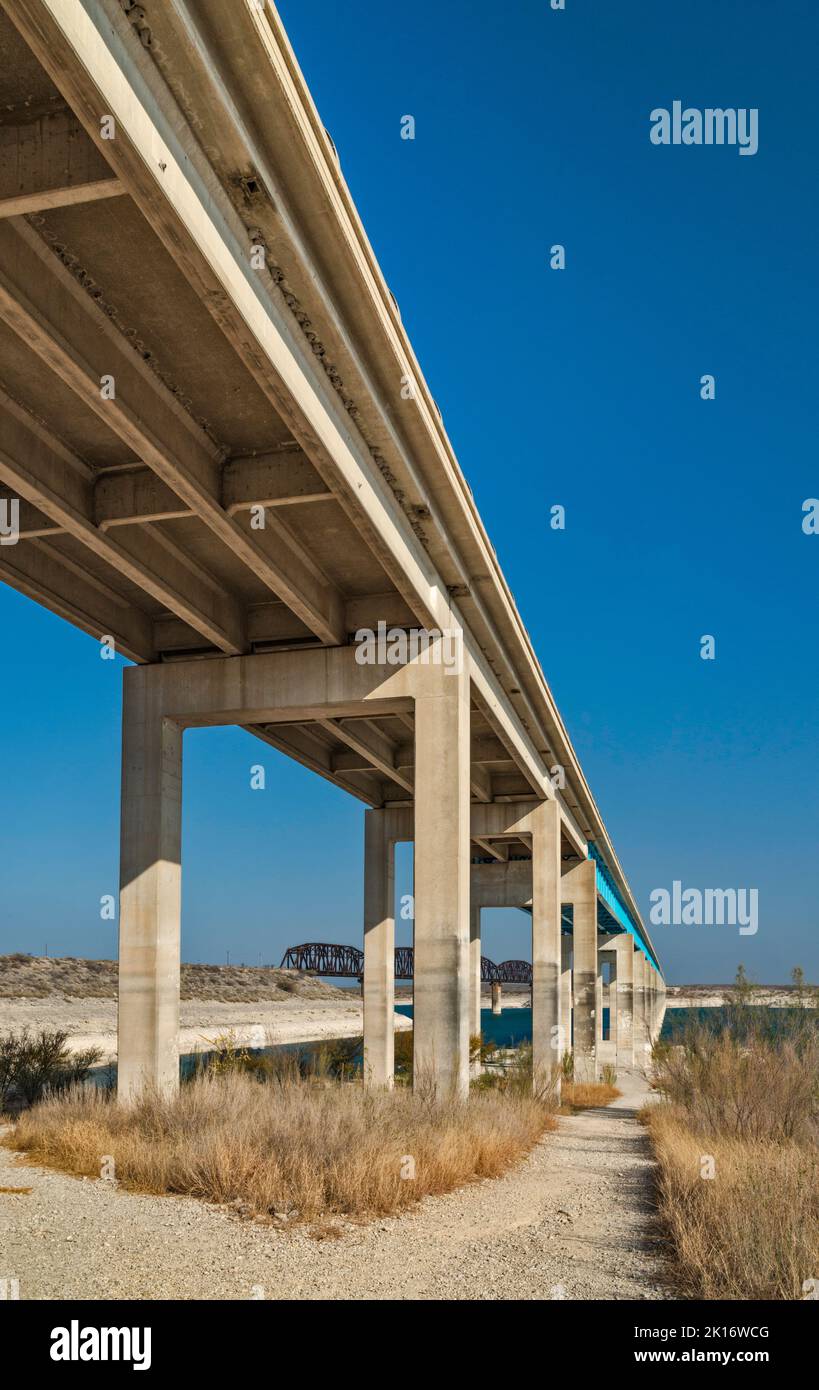 US-90 highway and railway bridges across Amistad Reservoir, very low ...