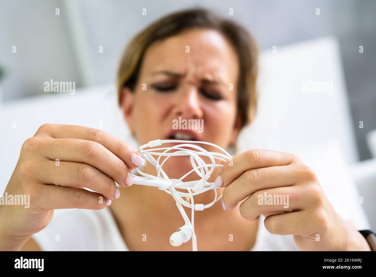 Tangled headphones hi-res stock photography and images - Alamy
