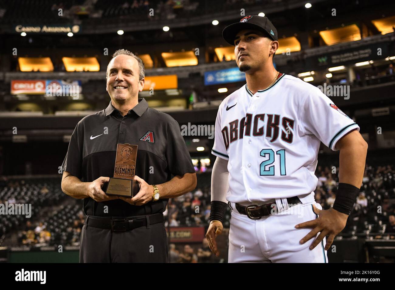 Arizona Diamondbacks CEO Derrick Hall presents second baseman Josh ...