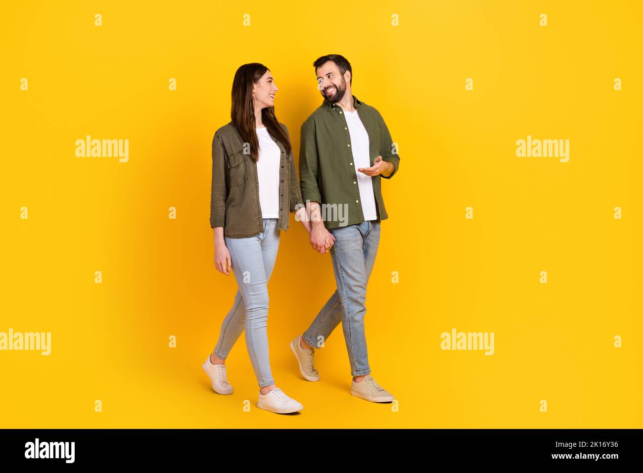 Full length body size view of attractive cheerful couple spending day ...