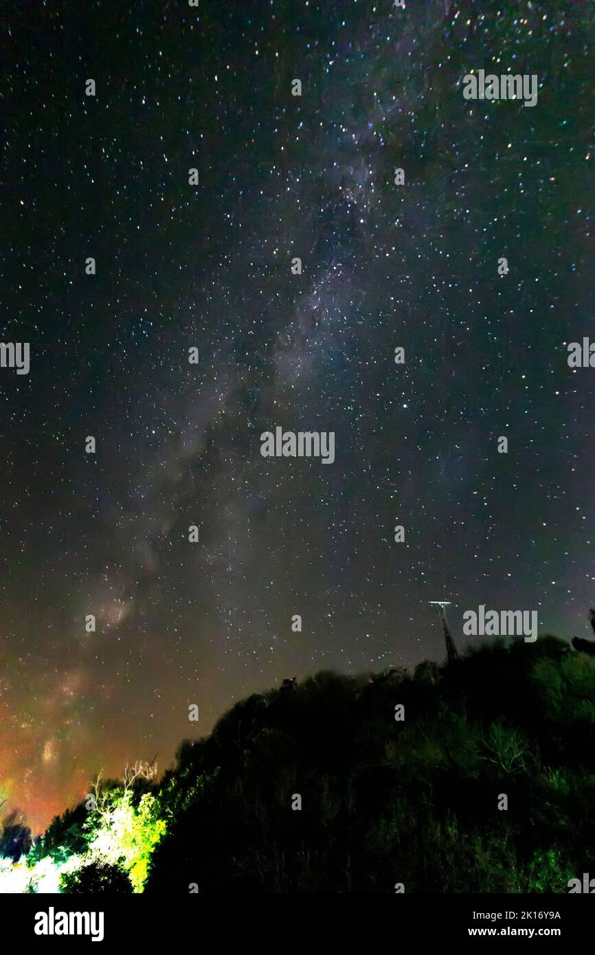 Night sky with stars and milky way over hill. Vertical view Stock Photo ... Night sky with stars and milky way over hill. Vertical view Stock Photo ...