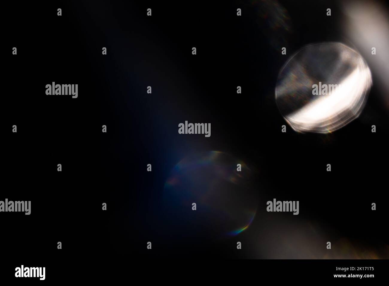 colorful rainbow crystal light leaks on black background Stock Photo ...