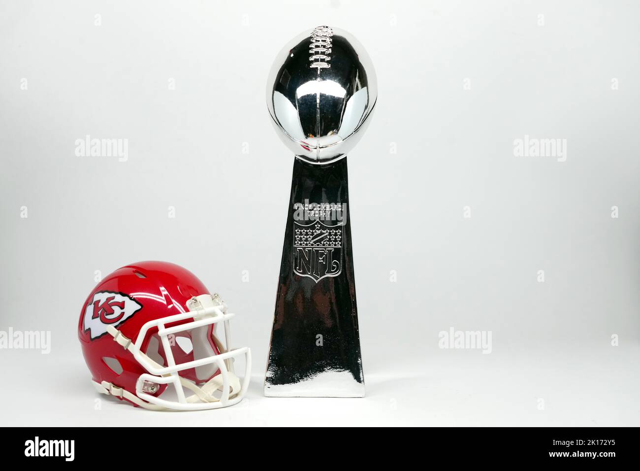 A Kansas City Chiefs helmet and Super Bowl Vince Lombardi Trophy ...