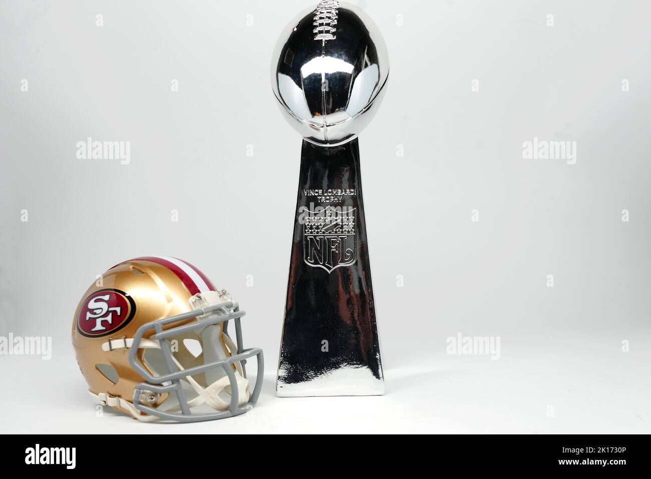 A San Francisco 49ers helmet and Super Bowl Vince Lombardi Trophy ...