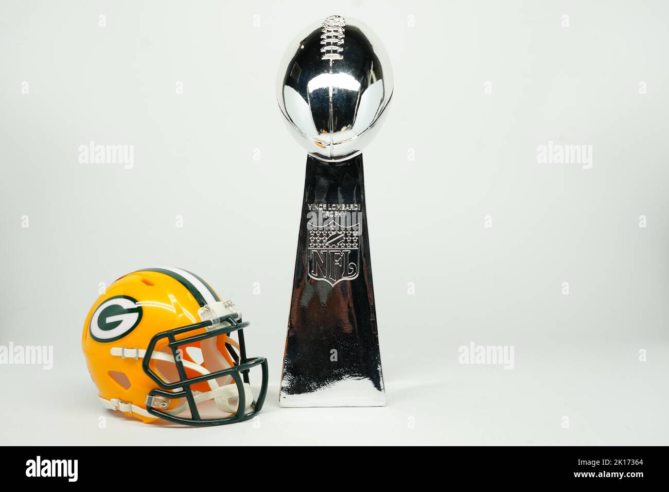 A Green Bay Packers helmet and Super Bowl Vince Lombardi Trophy ...