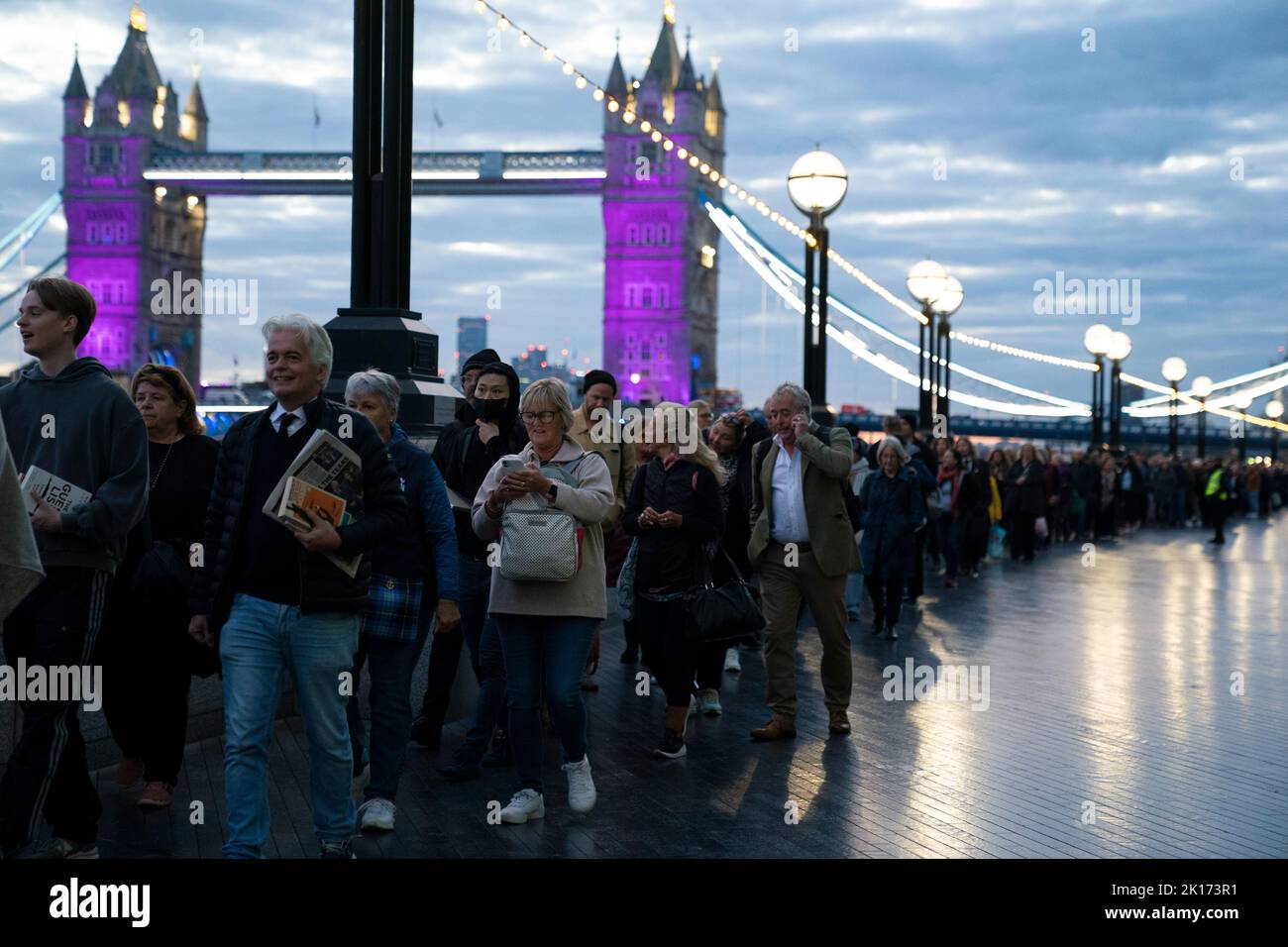 Members of the public in the queue at 06:09 on The Queen's Walk by ...