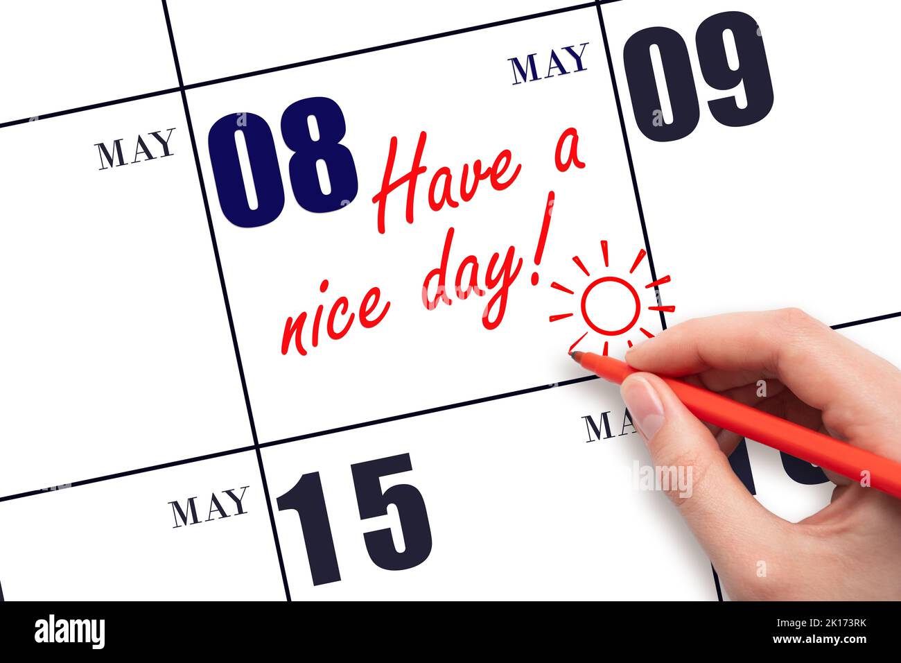 8th day of May. The hand writing the text Have a nice day and drawing ...