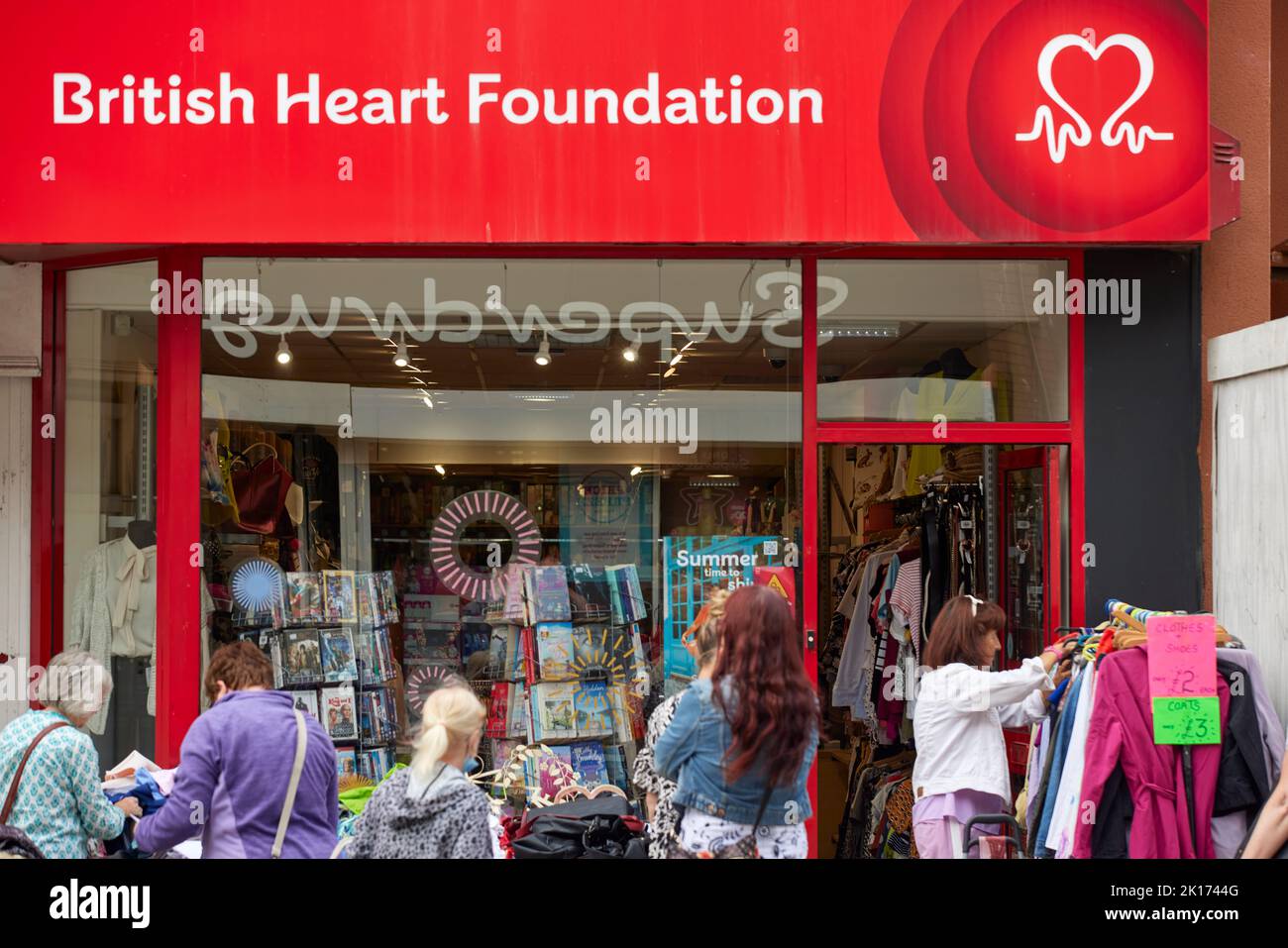 A busy British Heart Foundation charity shop on King Street South Shields Stock Photo - Alamy