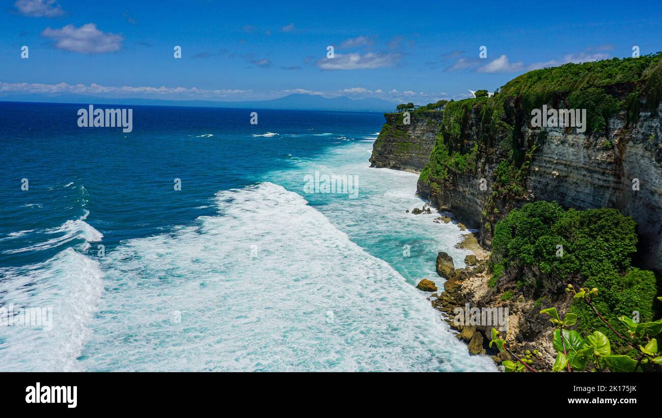 Landscape photo of stunning beaches in Bali in Uluwatu. The lush green ...