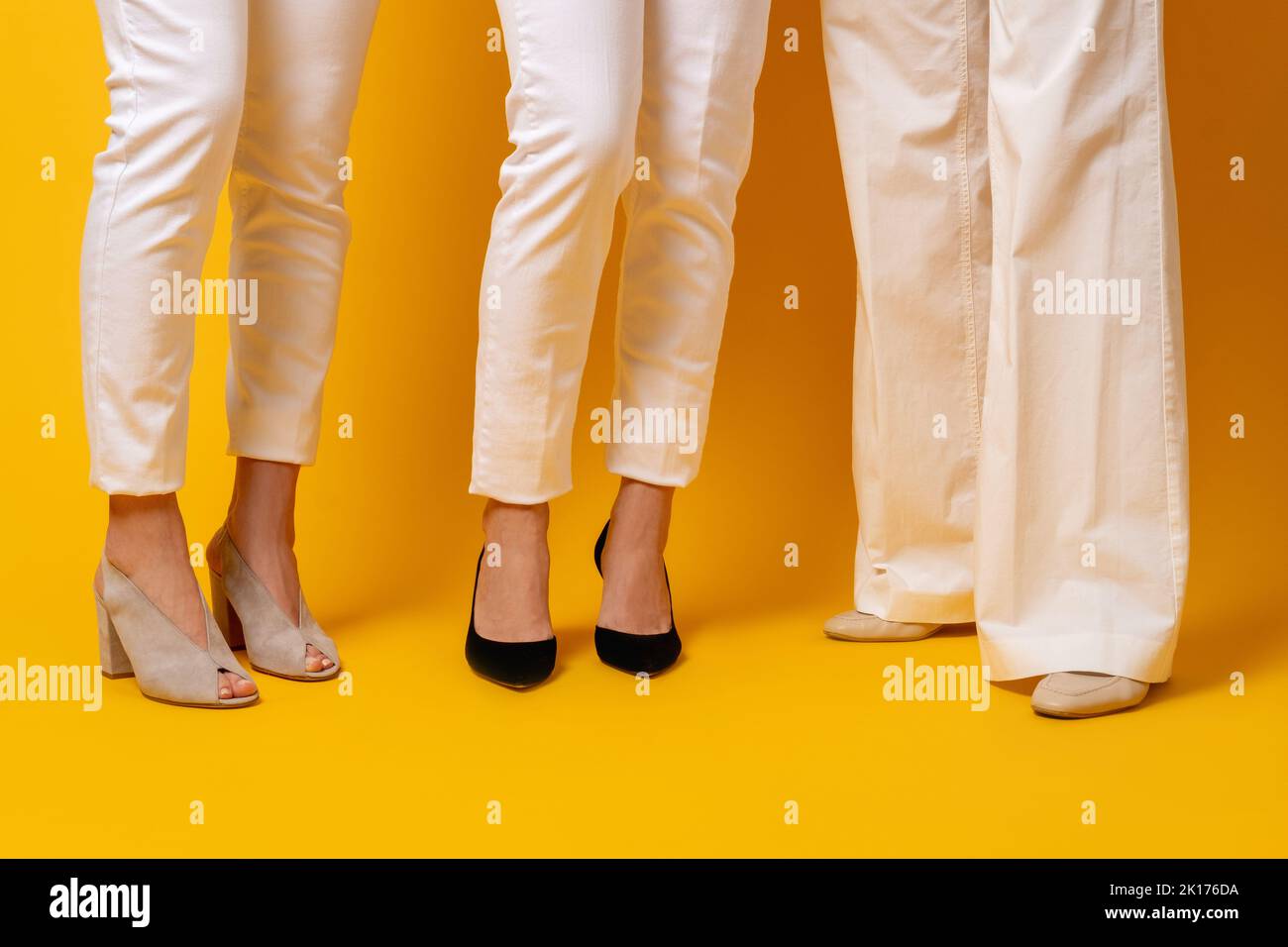Women lifestyle. Power confidence. Wealth success. Three female legs in ...
