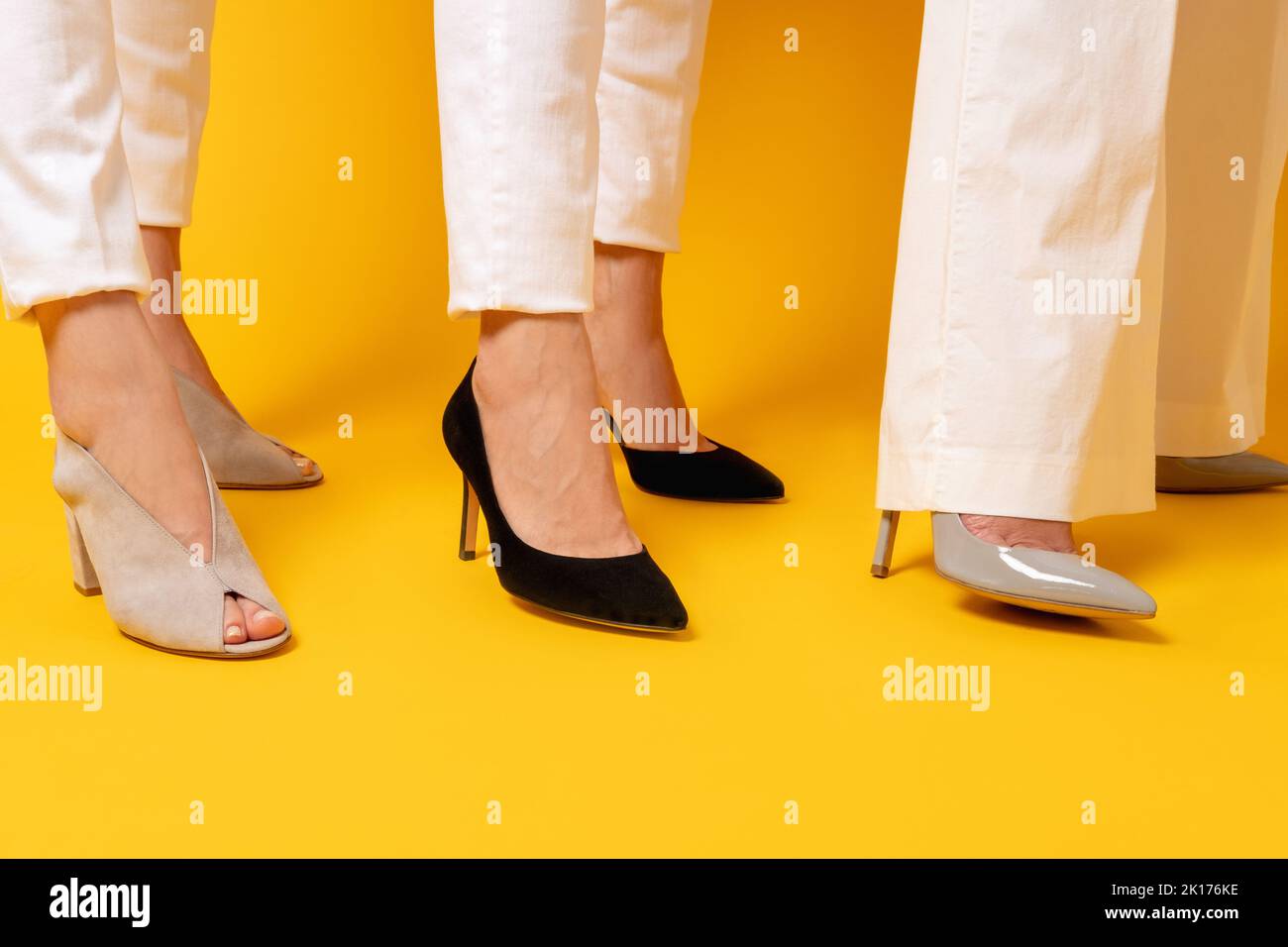 Female power. Solidarity unity. Teamwork cooperation. Three women legs ...