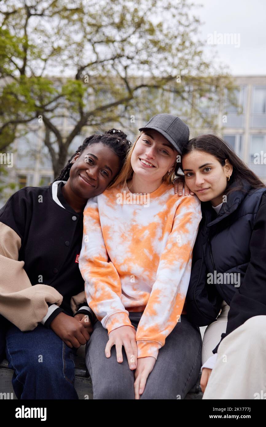 Three young female students at campus Stock Photo - Alamy