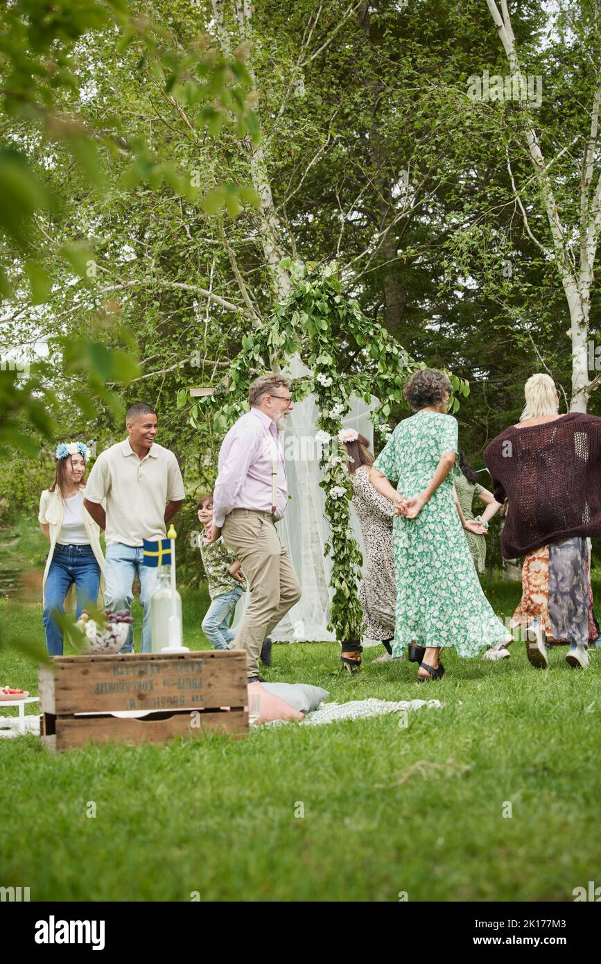 People dancing around maypole Stock Photo - Alamy