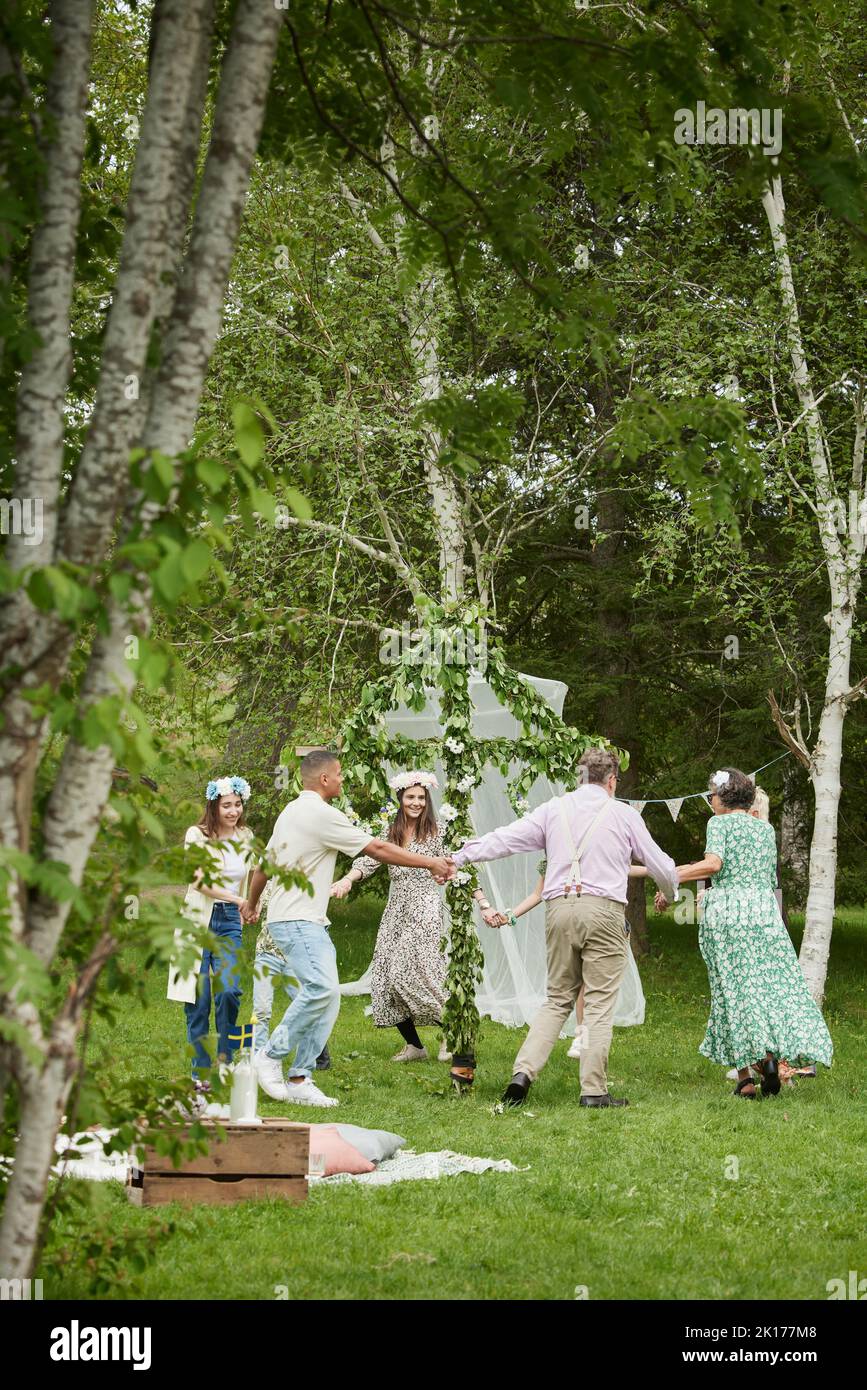 People dancing around maypole Stock Photo - Alamy