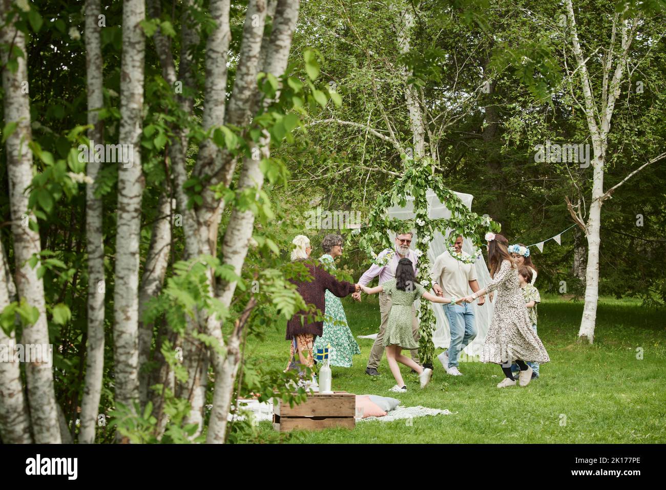 People dancing around maypole Stock Photo - Alamy