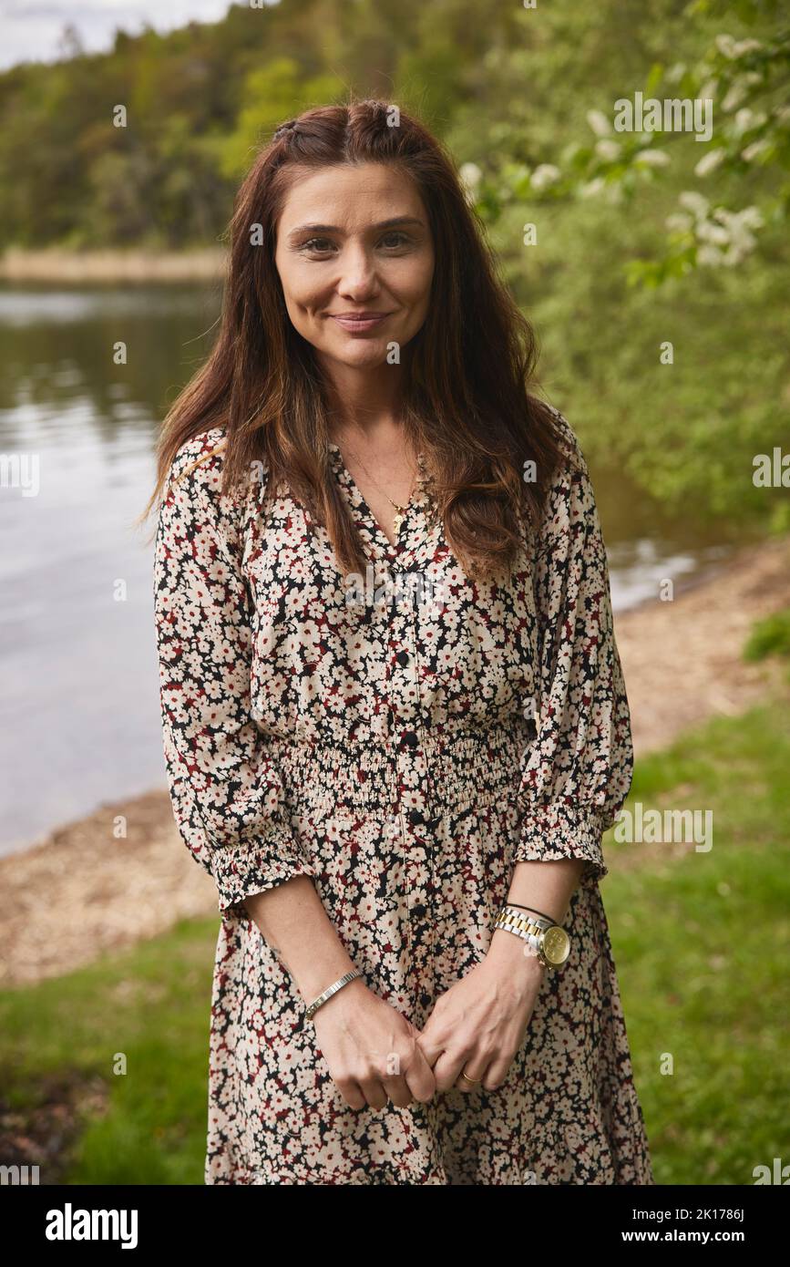 Front view smiling lady standing hi-res stock photography and images ...