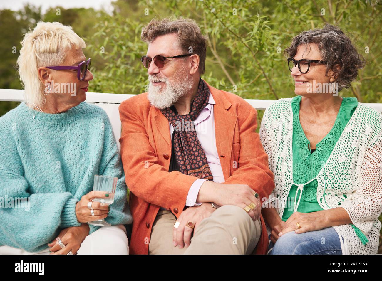 People sitting on bench Stock Photo - Alamy