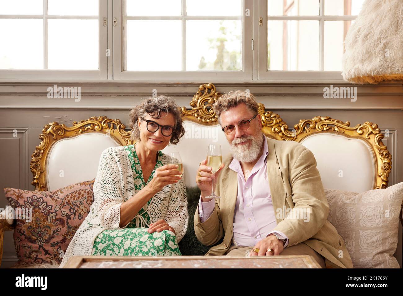 Couple having drink together Stock Photo - Alamy