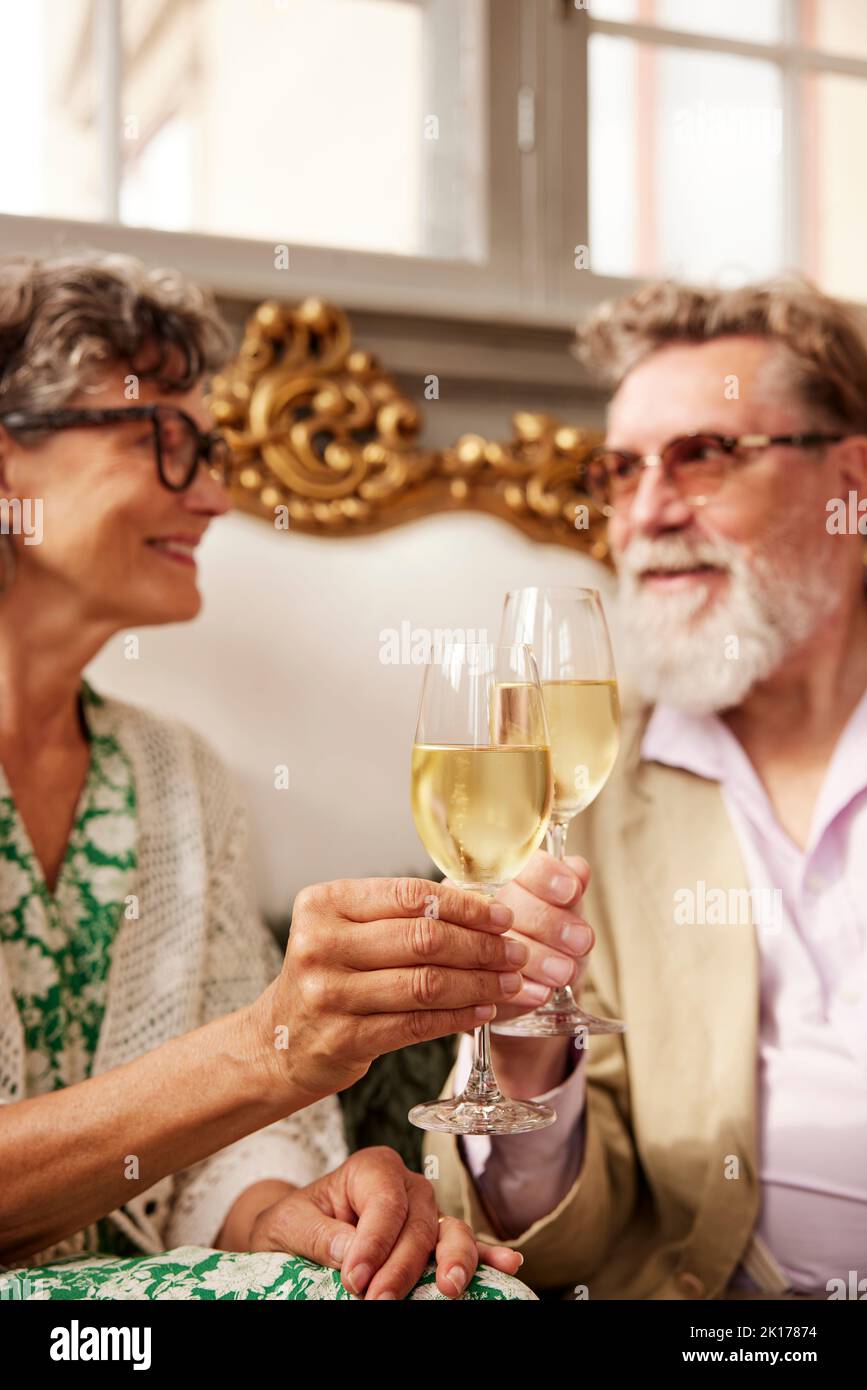 Couple having drink together Stock Photo - Alamy