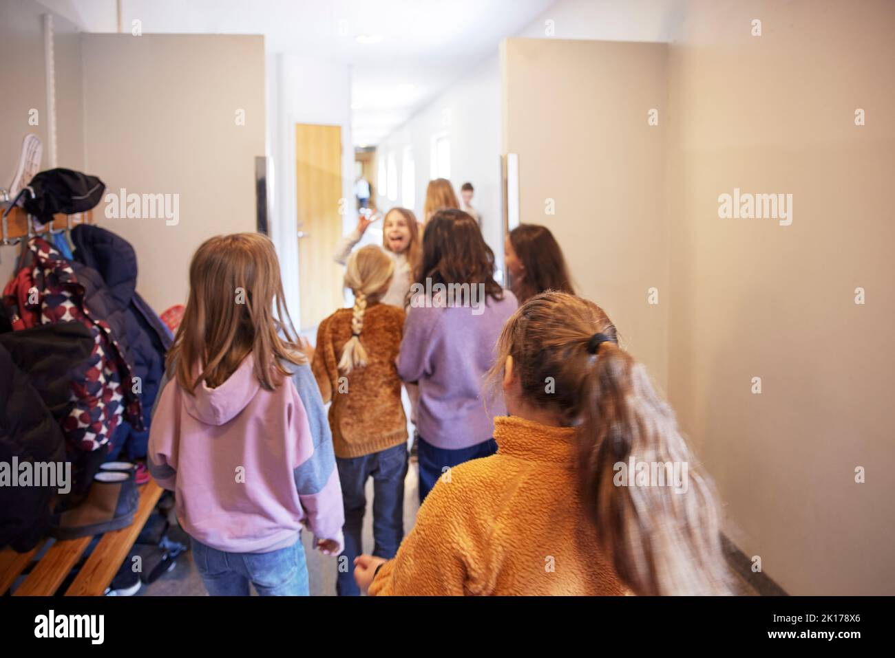 Girls at school corridor Stock Photo - Alamy